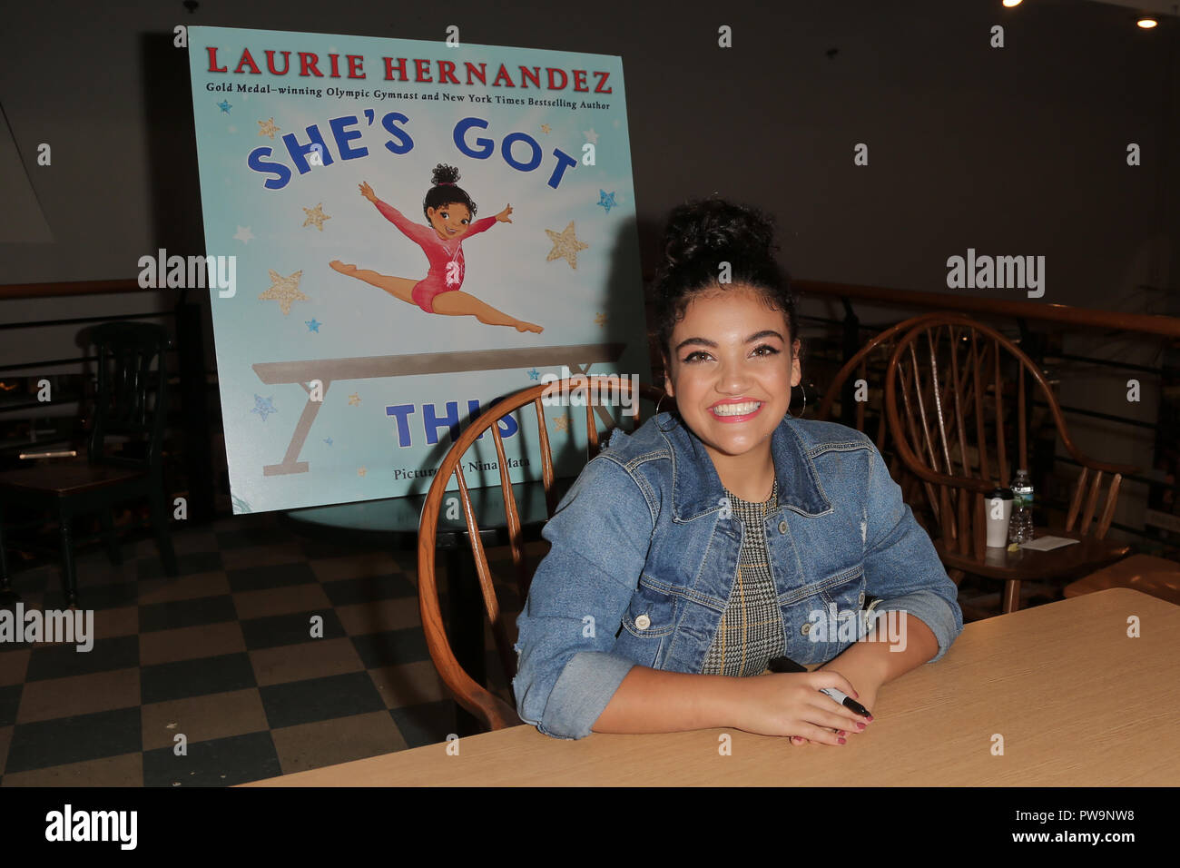 HUNTINGTON, NY - OCT 11: Olympian Laurie Hernandez signs copies of her ...
