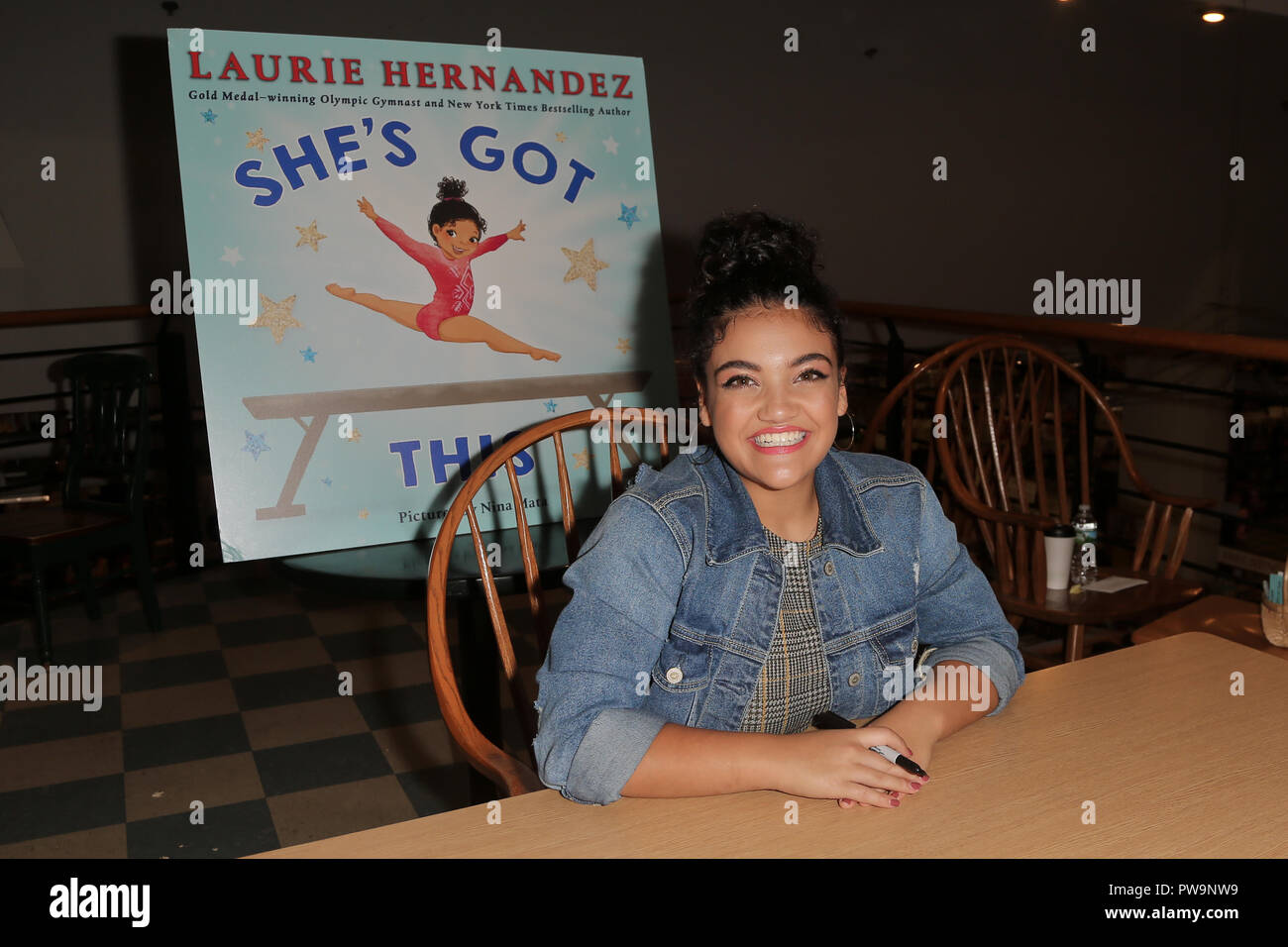 HUNTINGTON, NY - OCT 11: Olympian Laurie Hernandez signs copies of her ...