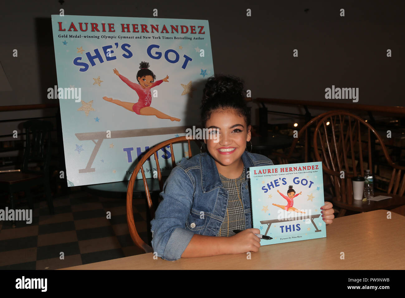 HUNTINGTON, NY - OCT 11: Olympian Laurie Hernandez signs copies of her ...