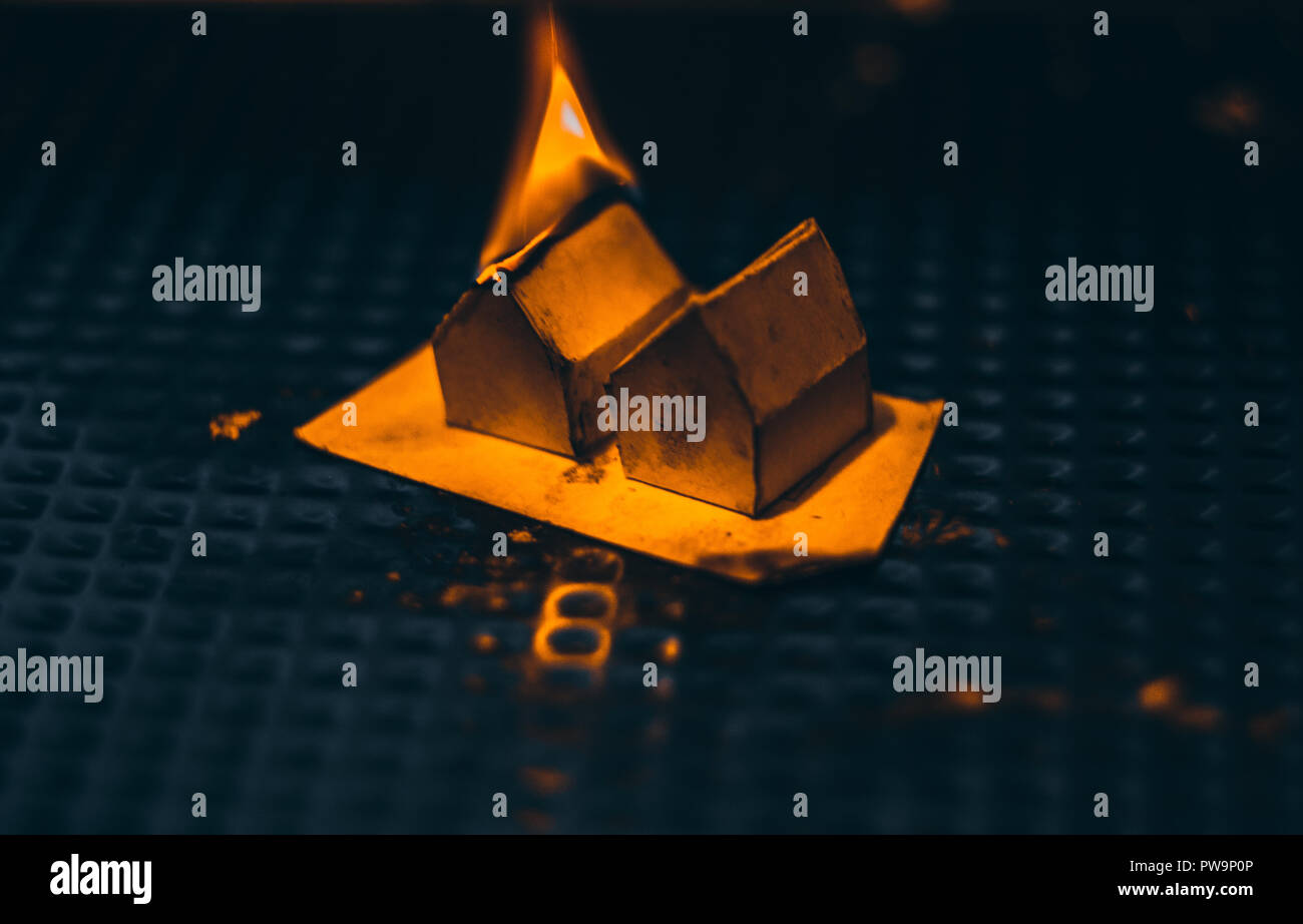 Burning paper house Stock Photo - Alamy