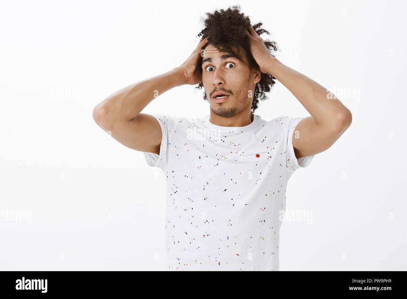 Guy realised he has son, being shocked and standing in stupor. Potrait ...