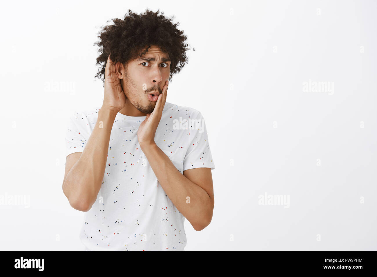 Portrait of gossiping stunned man. Portrait of shocked and stunned ...