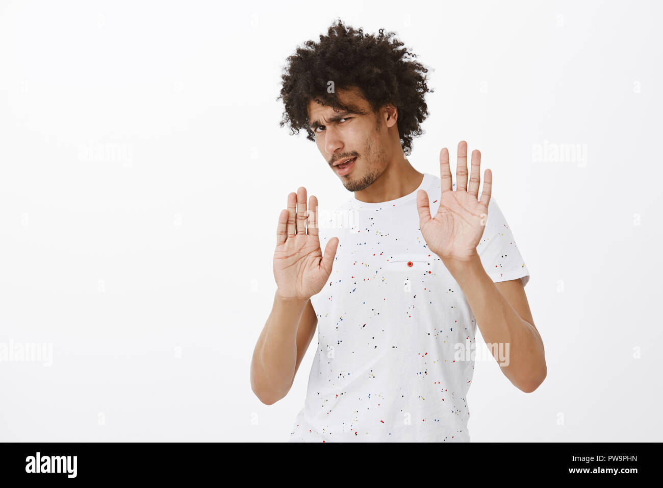 No mate stop. Displeased careless intense male model with afro ...