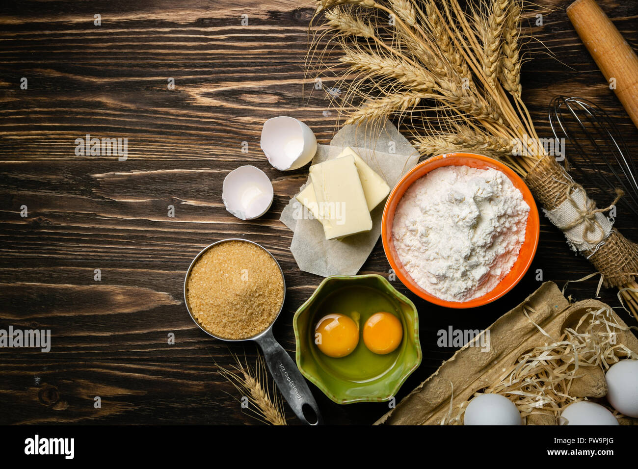 Baking concept - baking ingredients butter, flour, sugar, eggs on ...