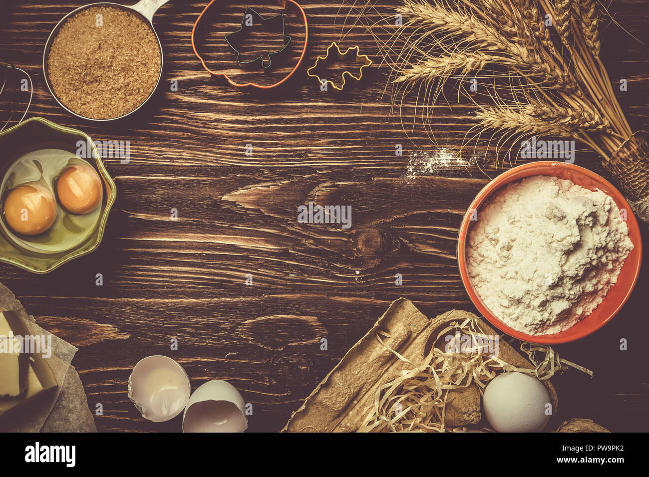 Baking concept - baking ingredients butter, flour, sugar, eggs on ...