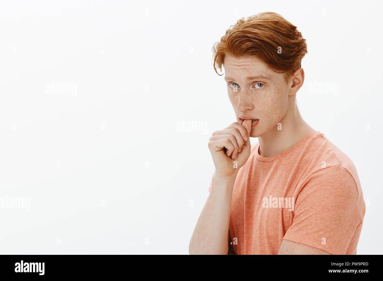 I cannot decide by myself. Portrait of doubtful timid and cute ...