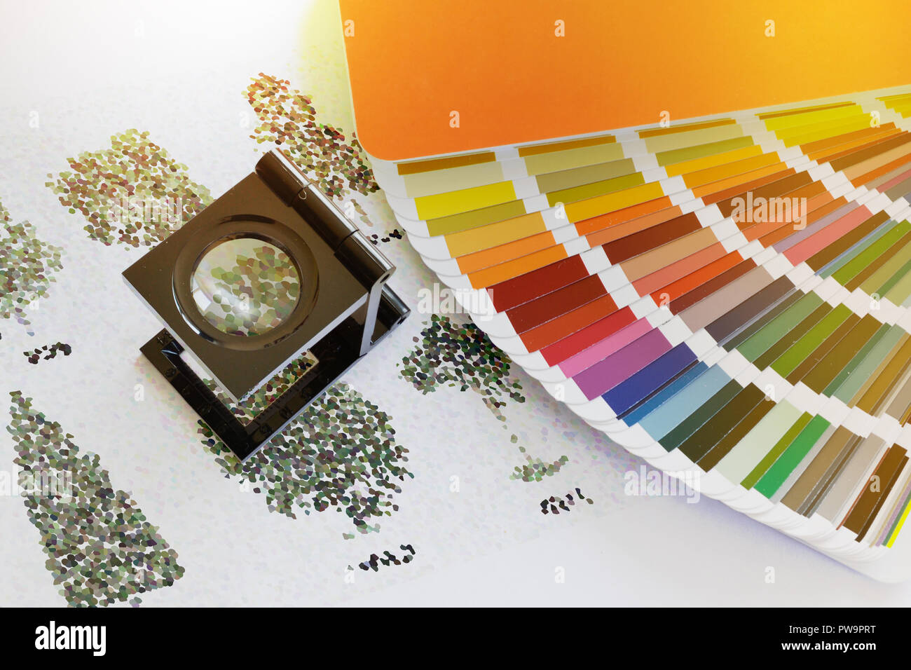 magnifier for checking print samples and color Stock Photo - Alamy