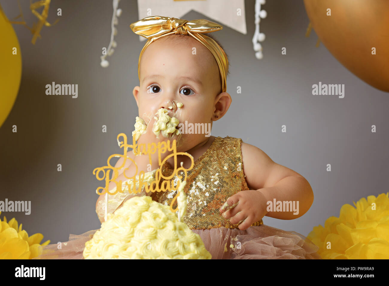 Blond baby girl eating hi-res stock photography and images - Alamy