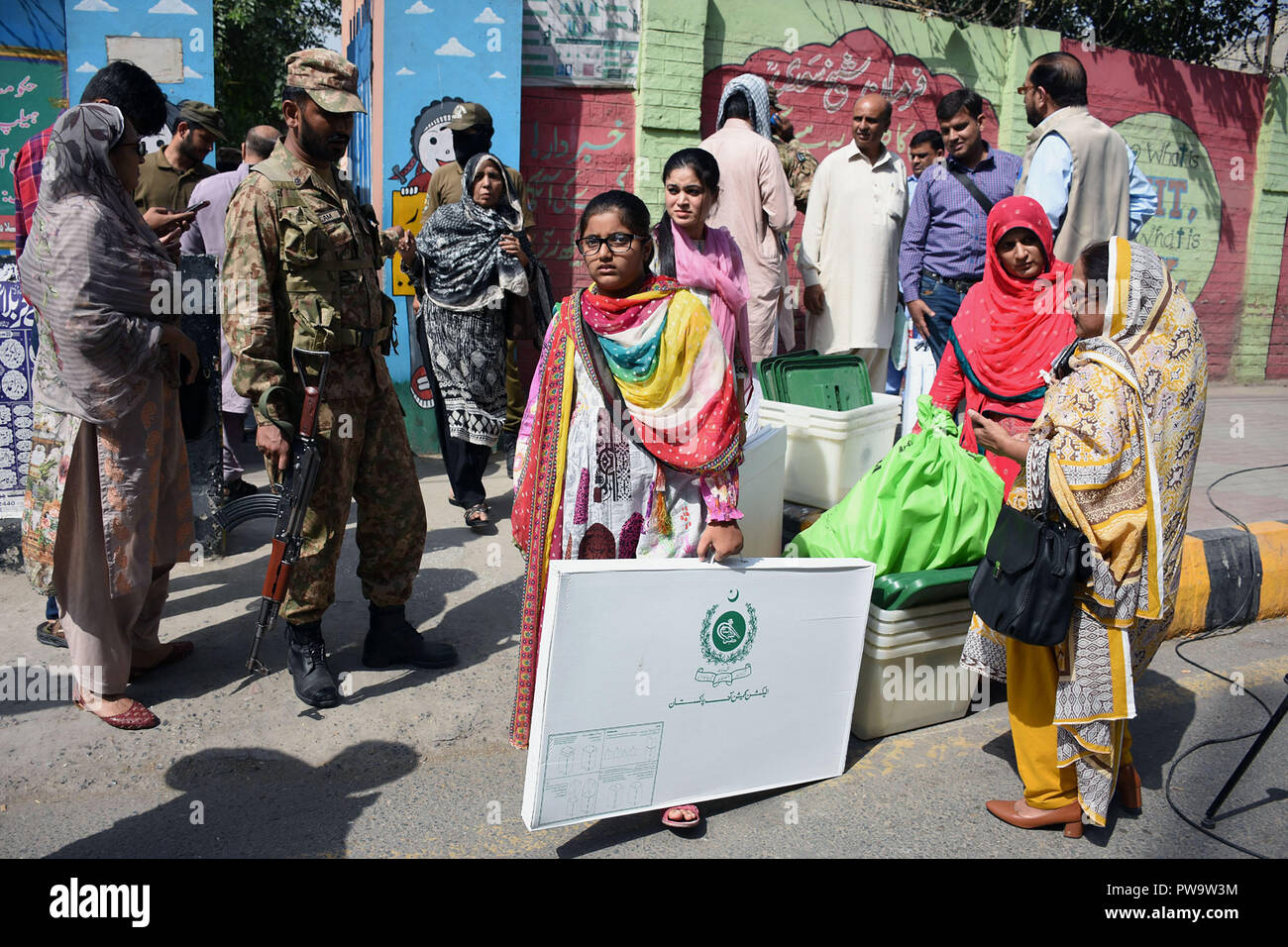 Election staff carry ballot boxes hi-res stock photography and images ...
