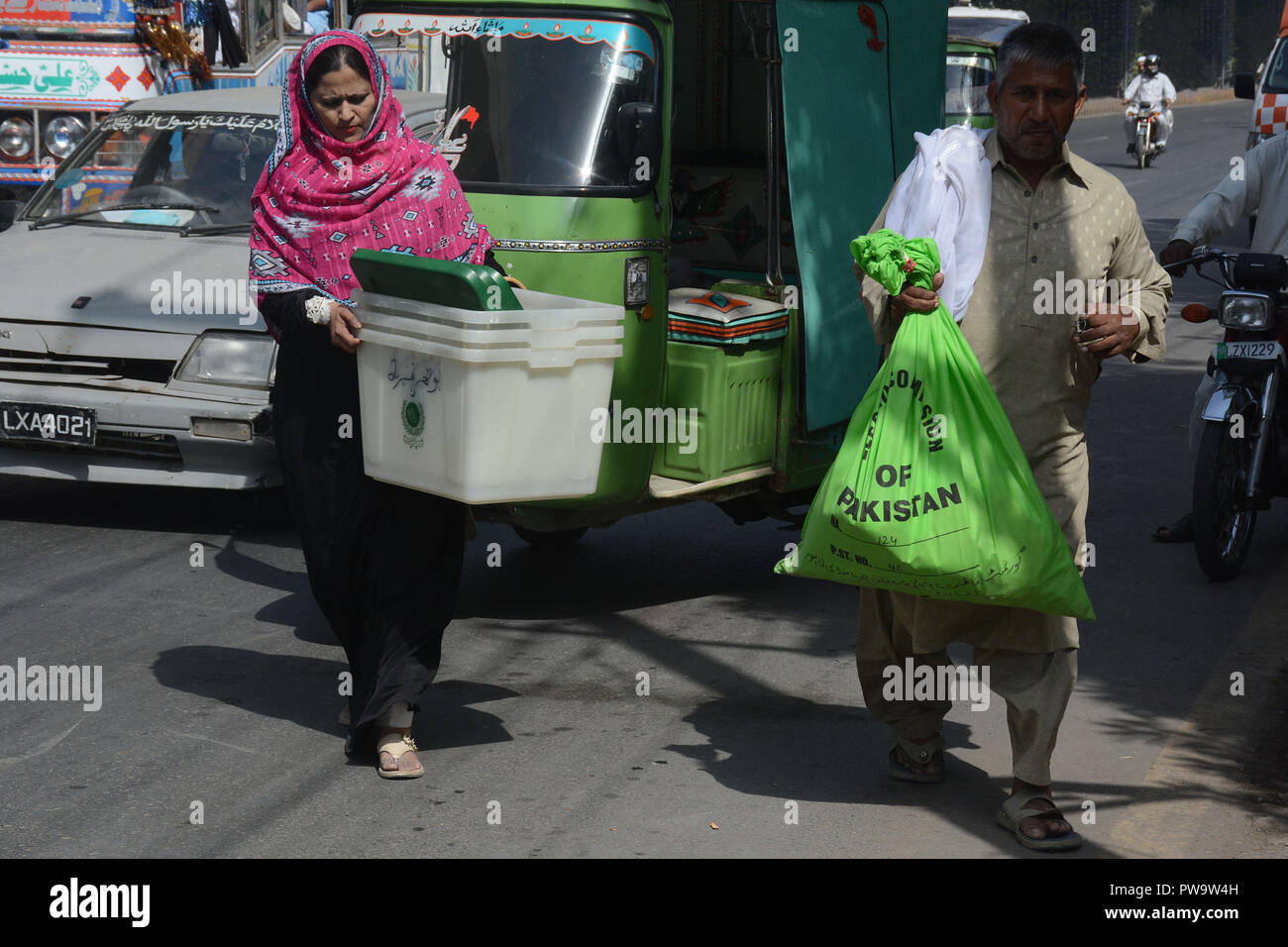 Election staff carry ballot boxes hi-res stock photography and images ...