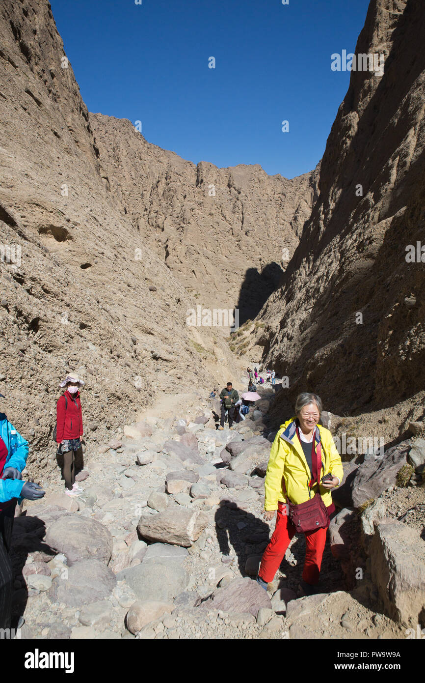 People trekking up to Shipton's Arch, Xinjiang, China Stock Photo - Alamy
