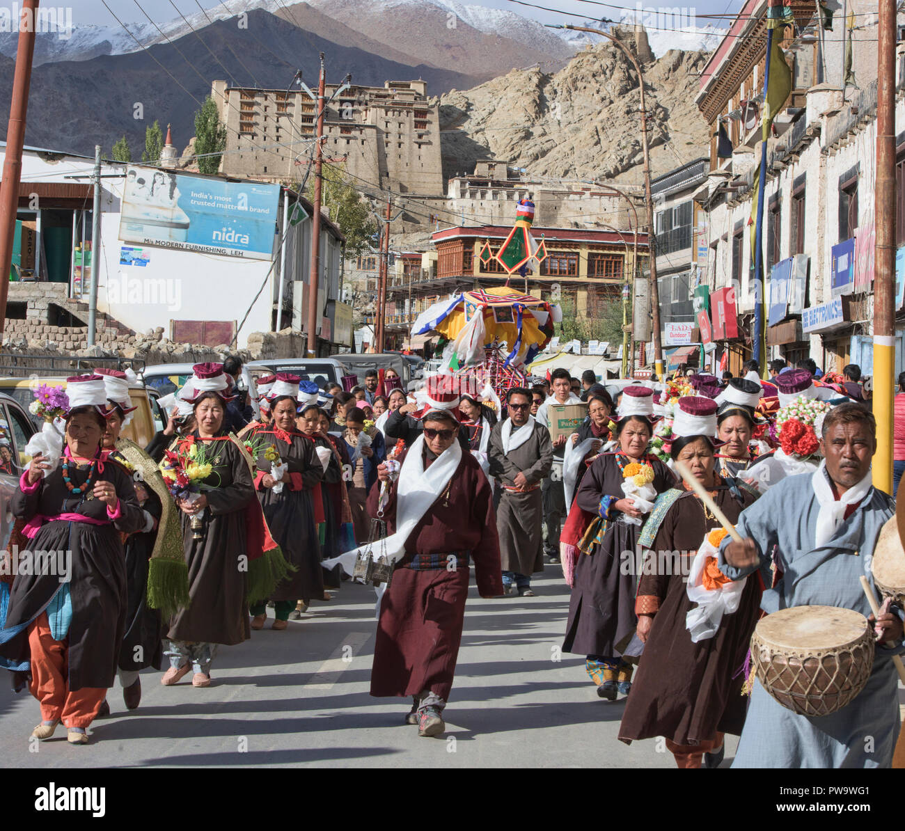 Ladakhis parade through the streets at a Tara prayer festival, Leh ...