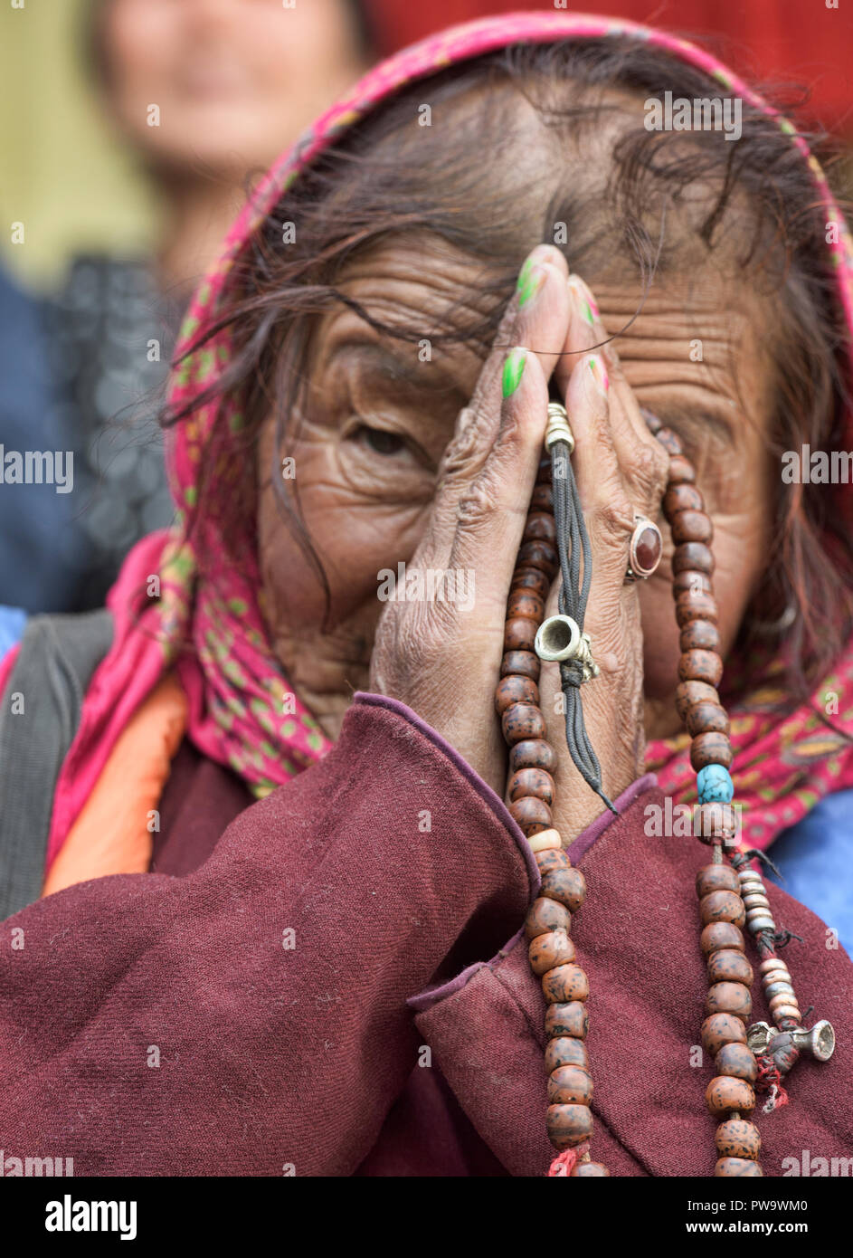 Pilgrim at a traditional Tara prayer ritual, Leh, Ladakh, India Stock ...