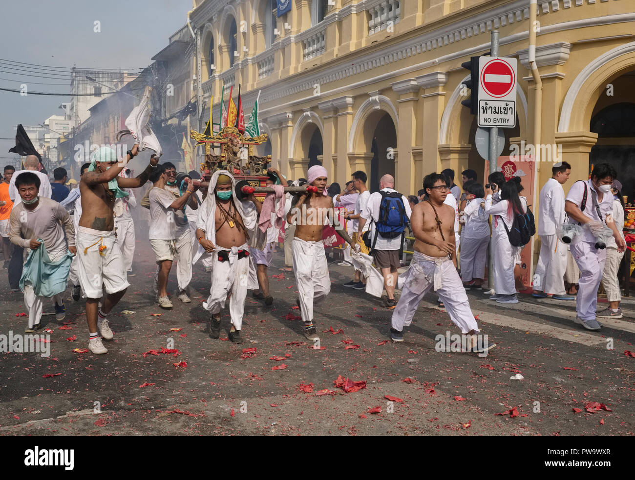 Palanquin bearers in a procession during the Vegetarian Festival (Nine ...