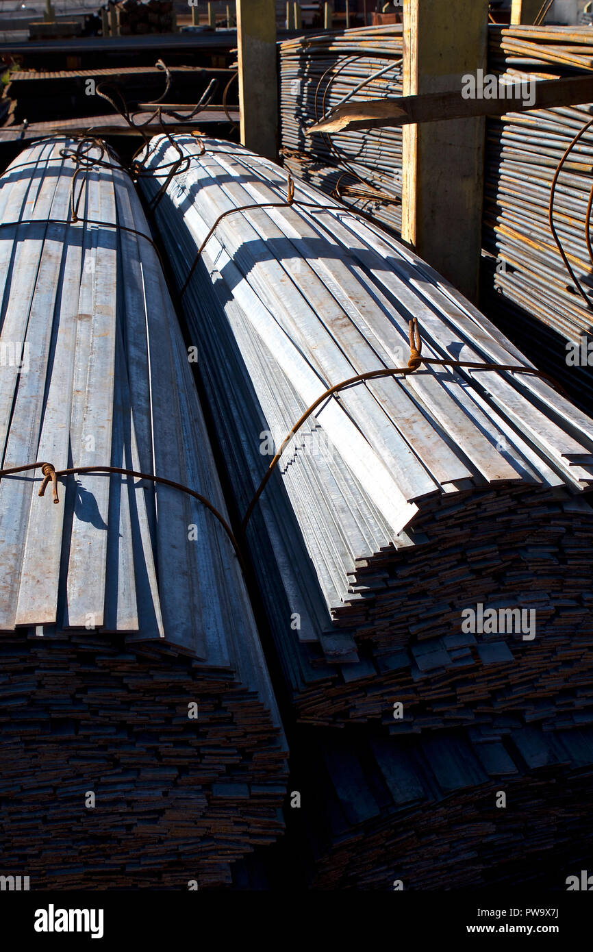 Metal profile strip in packs at the warehouse of metal products Stock ...