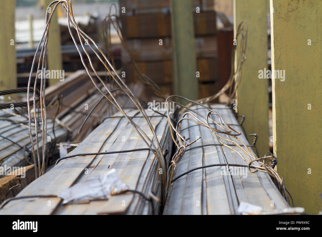 Metal profile strip in packs at the warehouse of metal products Stock ...