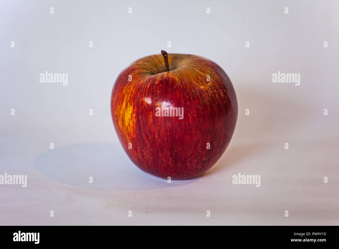 Single Red Apple Stock Photo - Alamy