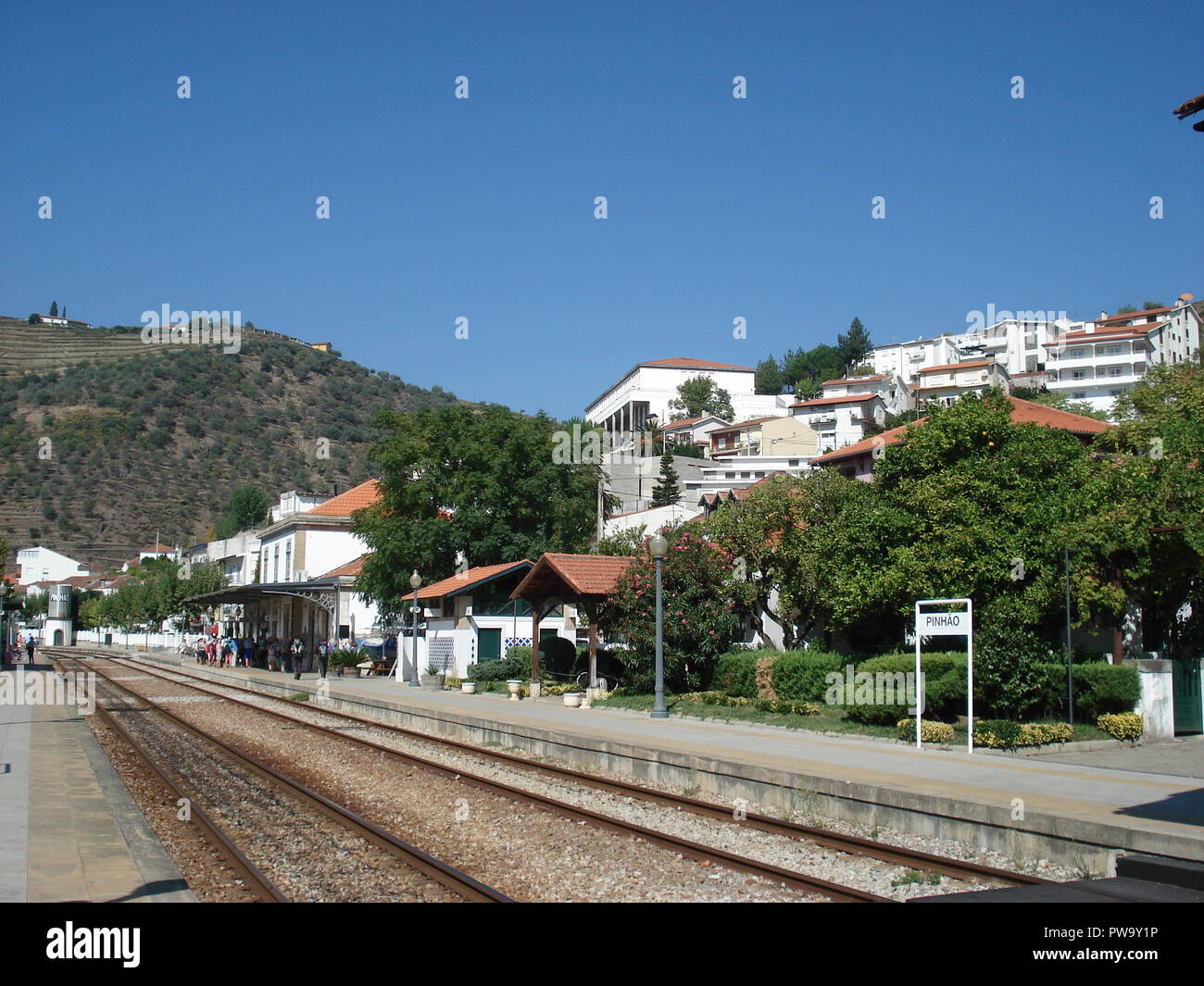 Pinhao railway station in Portugal on a sunny morning. People waiting ...