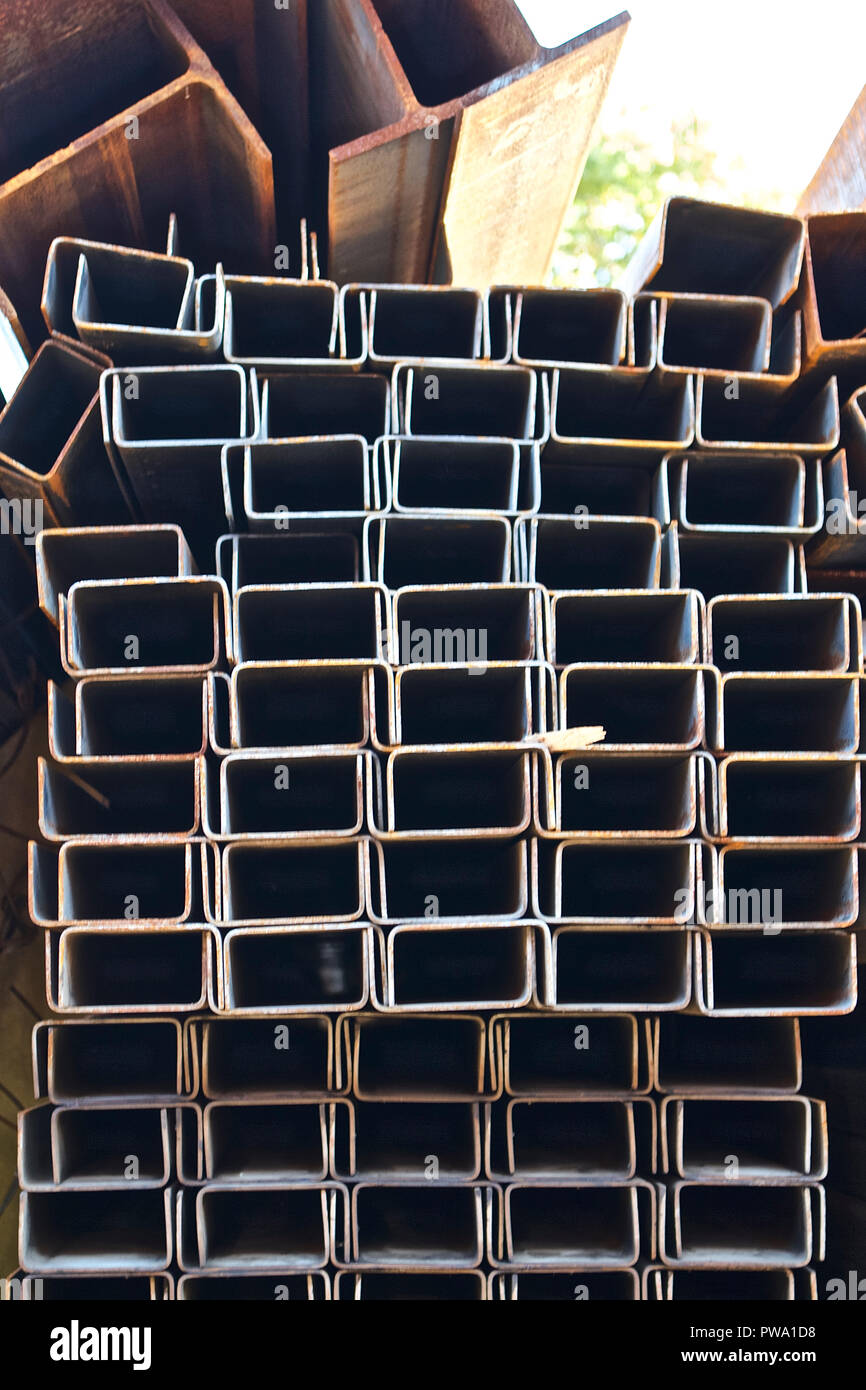 Metal profile channel in packs at the warehouse of metal products Stock ...