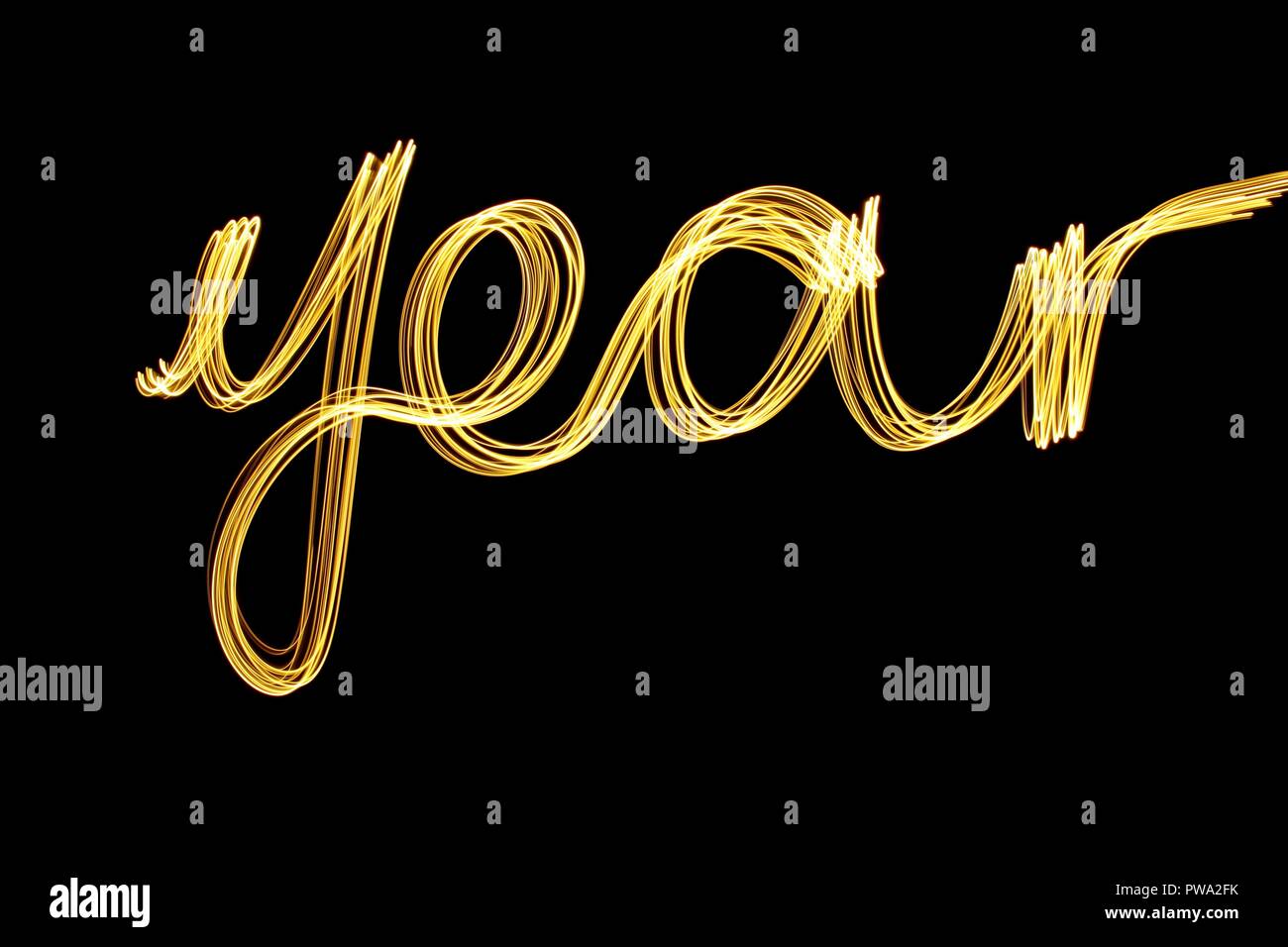 Light painting photography, long exposure, gold metallic yellow light ...