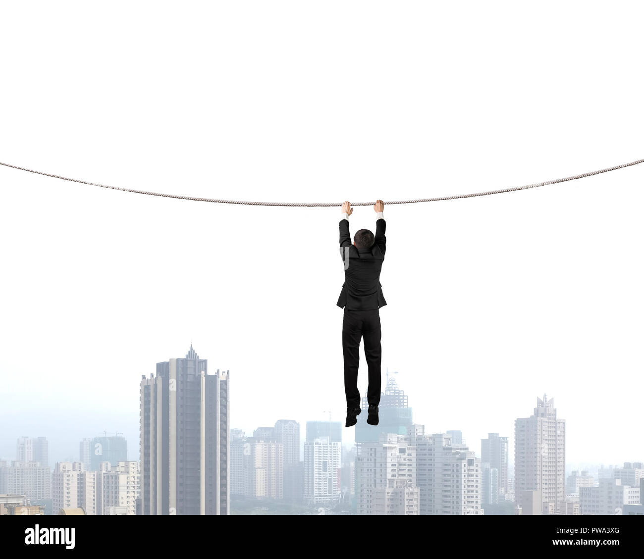 Businessman hanging rope hi-res stock photography and images - Alamy