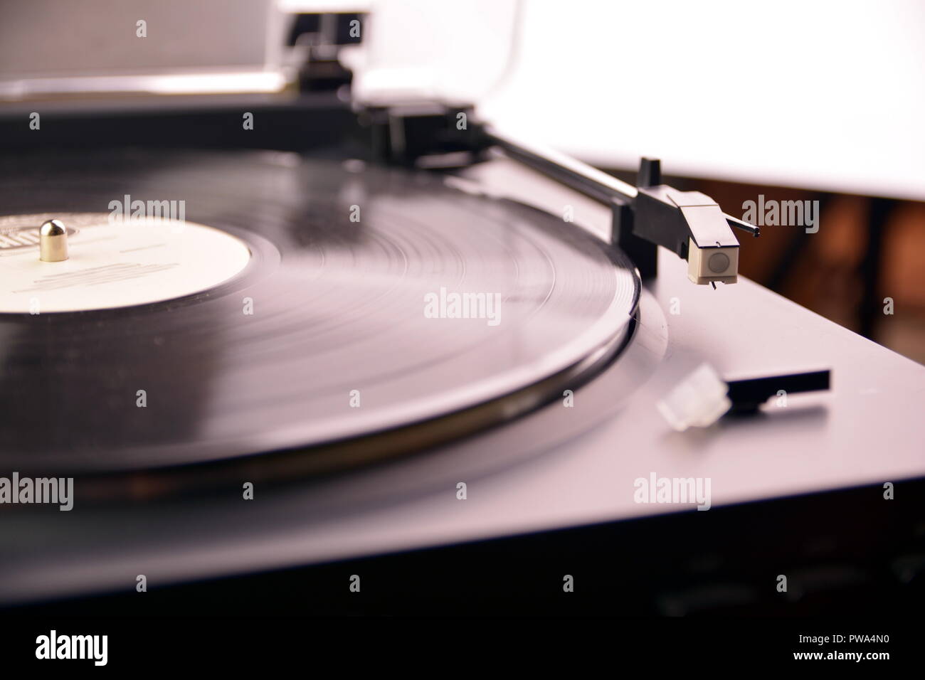 Turntable vinyl record player is playing music Stock Photo - Alamy