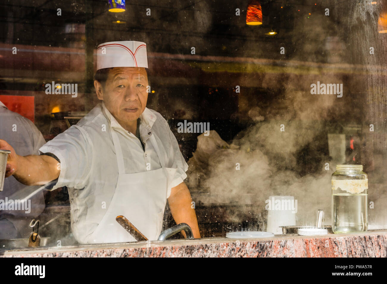 Cook Chinatown Manhattan New York, New York, USA Stock Photo - Alamy
