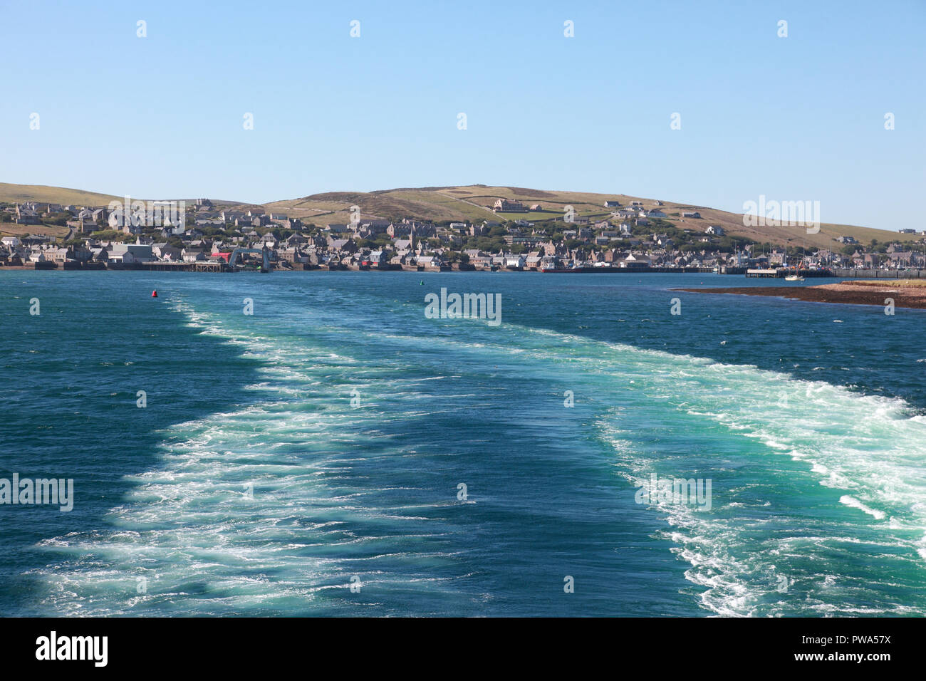 The NorthLink ferry Hamnavoe leaving Stromness on Orkney Stock Photo ...