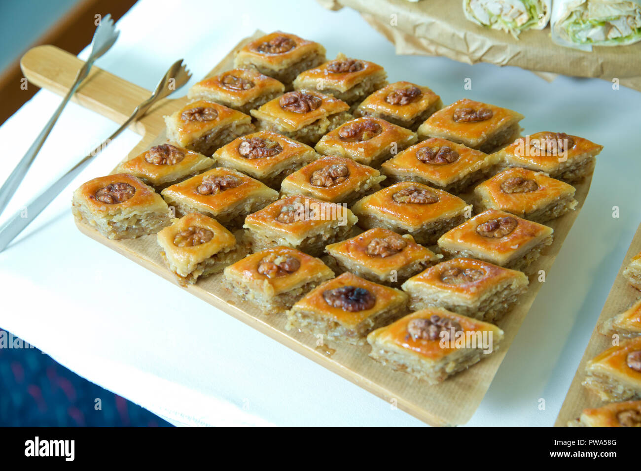 Traditional pakhlava baklava pastry on novruz tray with dry fruits ...