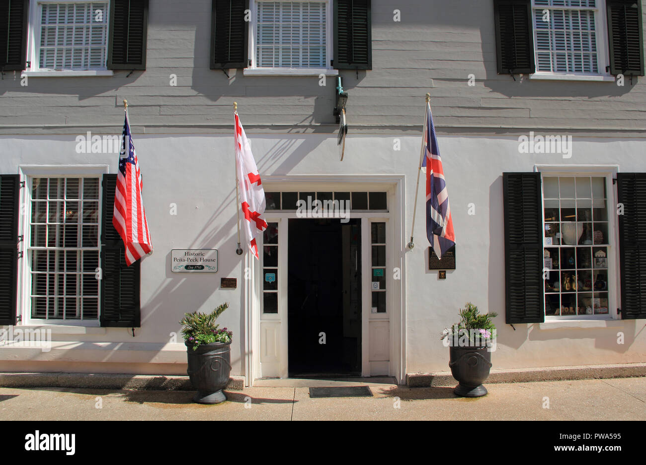 An open door invites visitors to tour the Pena-Peck House, one of the ...