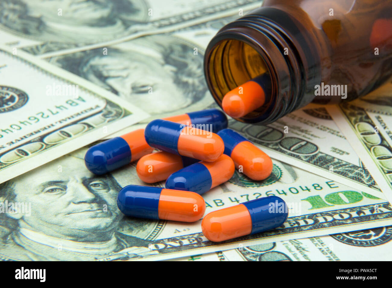 Money bottle pills on hi-res stock photography and images - Alamy