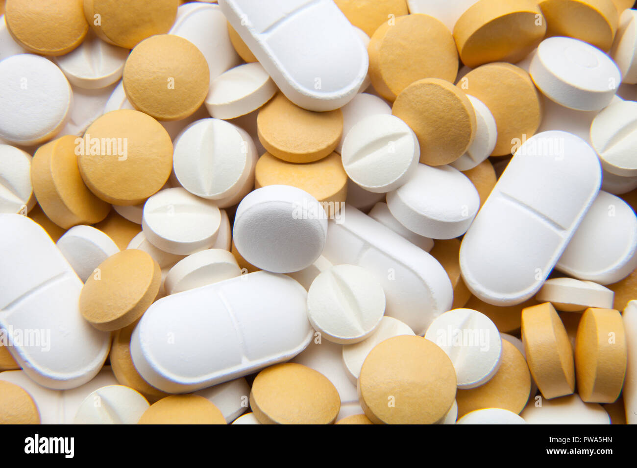 pills of different forms and colors Stock Photo - Alamy