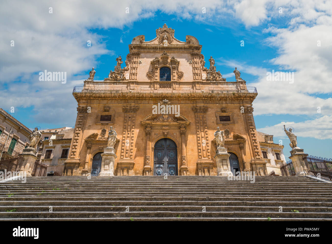 Scenic sight in Modica with the Cathedral of San Pietro and the Duomo ...