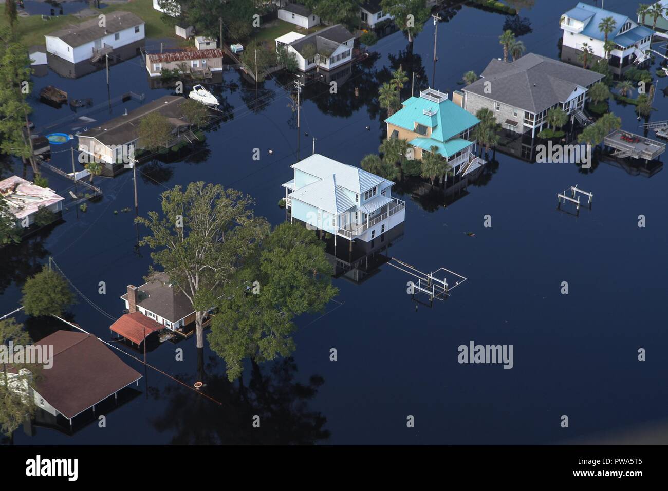 Residential neighborhoods surrounded by flood waters in the aftermath ...