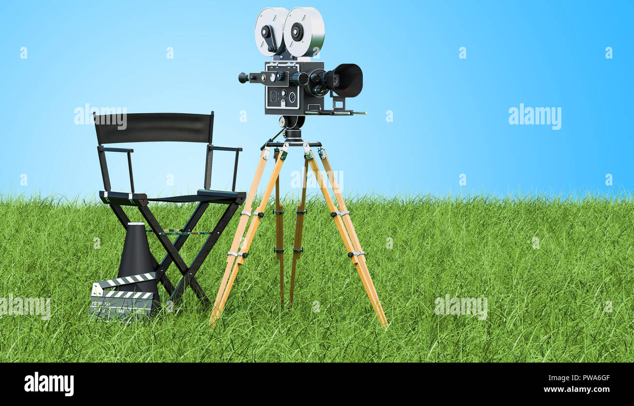 Cinema concept. Movie camera with film reels, chair, megaphone and ...