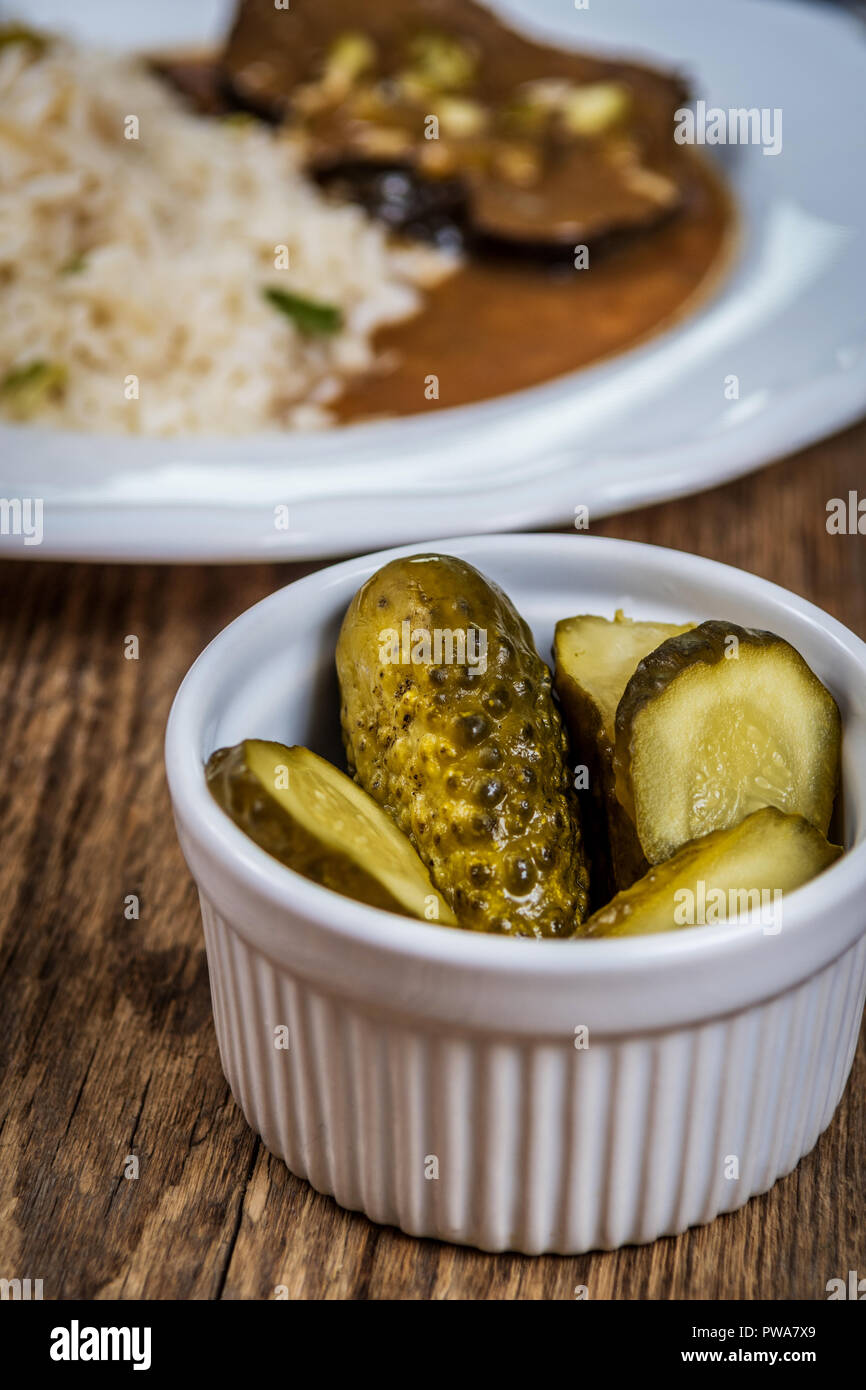 Czech traditional food Znojmo's sauce with gherkin and pork meat and ...