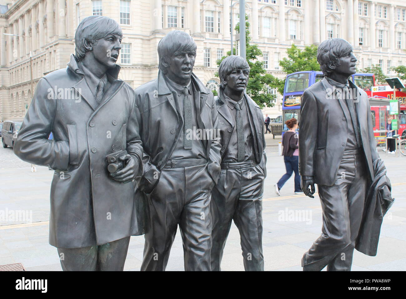 The Beatles statue in Liverpool Albert Dock. Famous monument to John ...