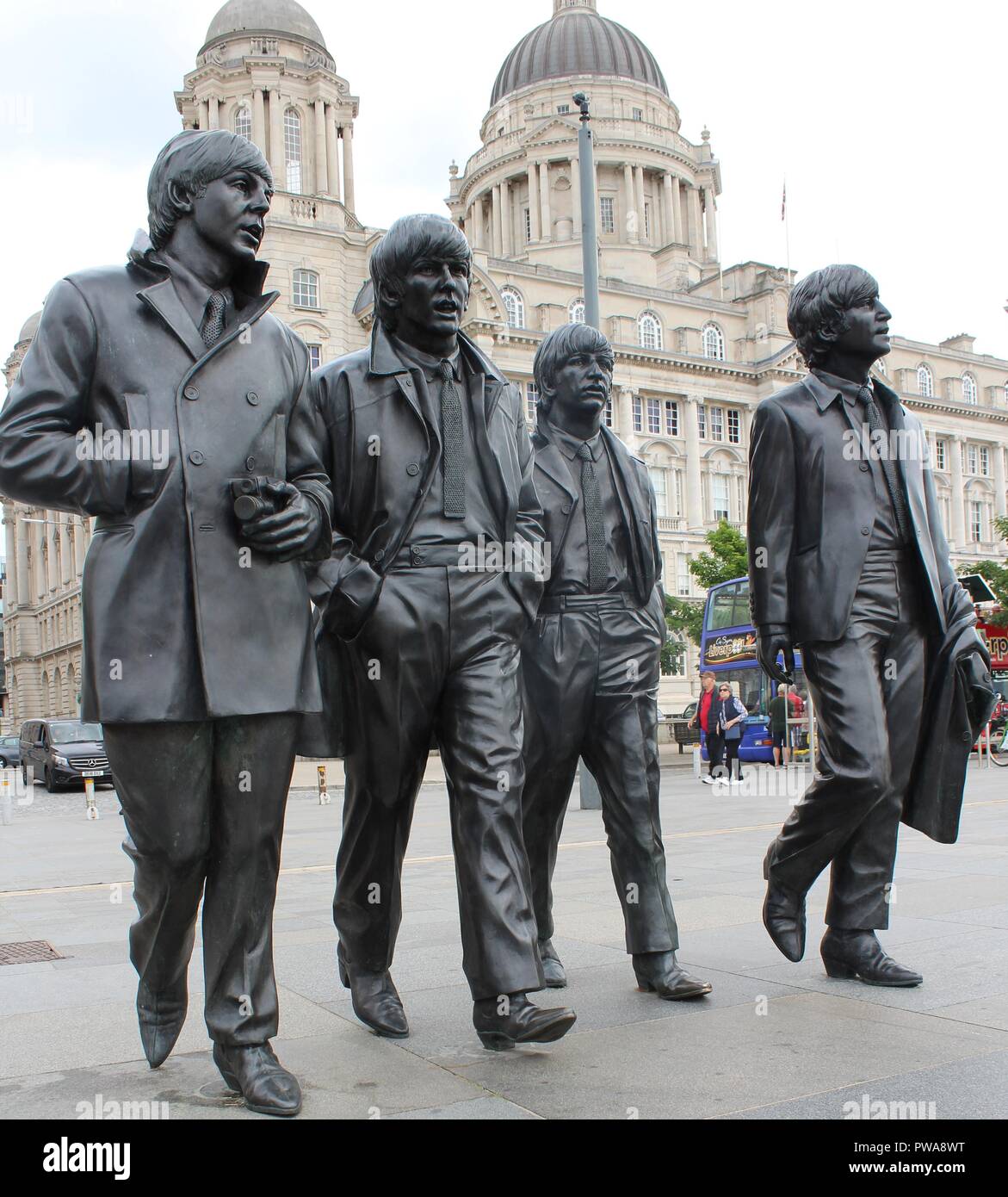 The Beatles statue in Liverpool Albert Dock. Famous monument to John ...