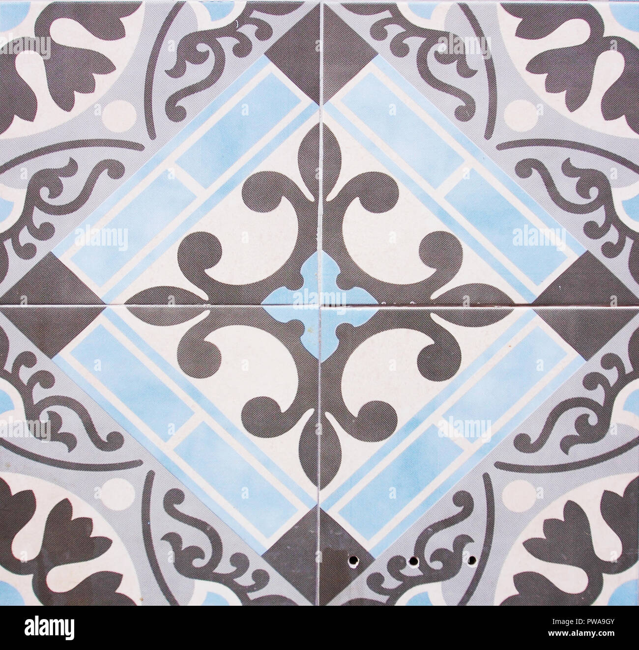 Detail of the traditional tiles from facade of old house. Decorative ...