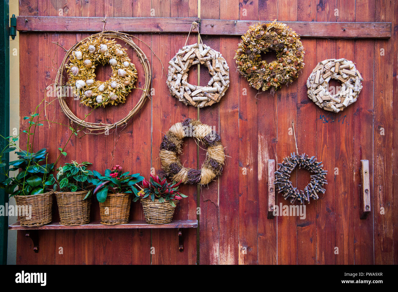 Beautiful traditional street decoration with wreaths and flowers Stock ...