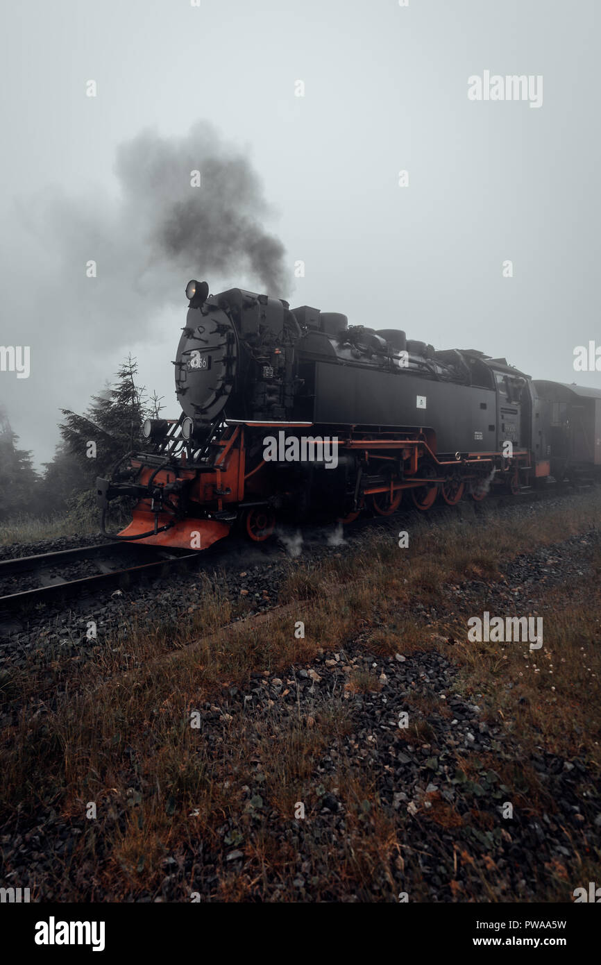 Old steam locomotive in harzmountains with fog Stock Photo - Alamy