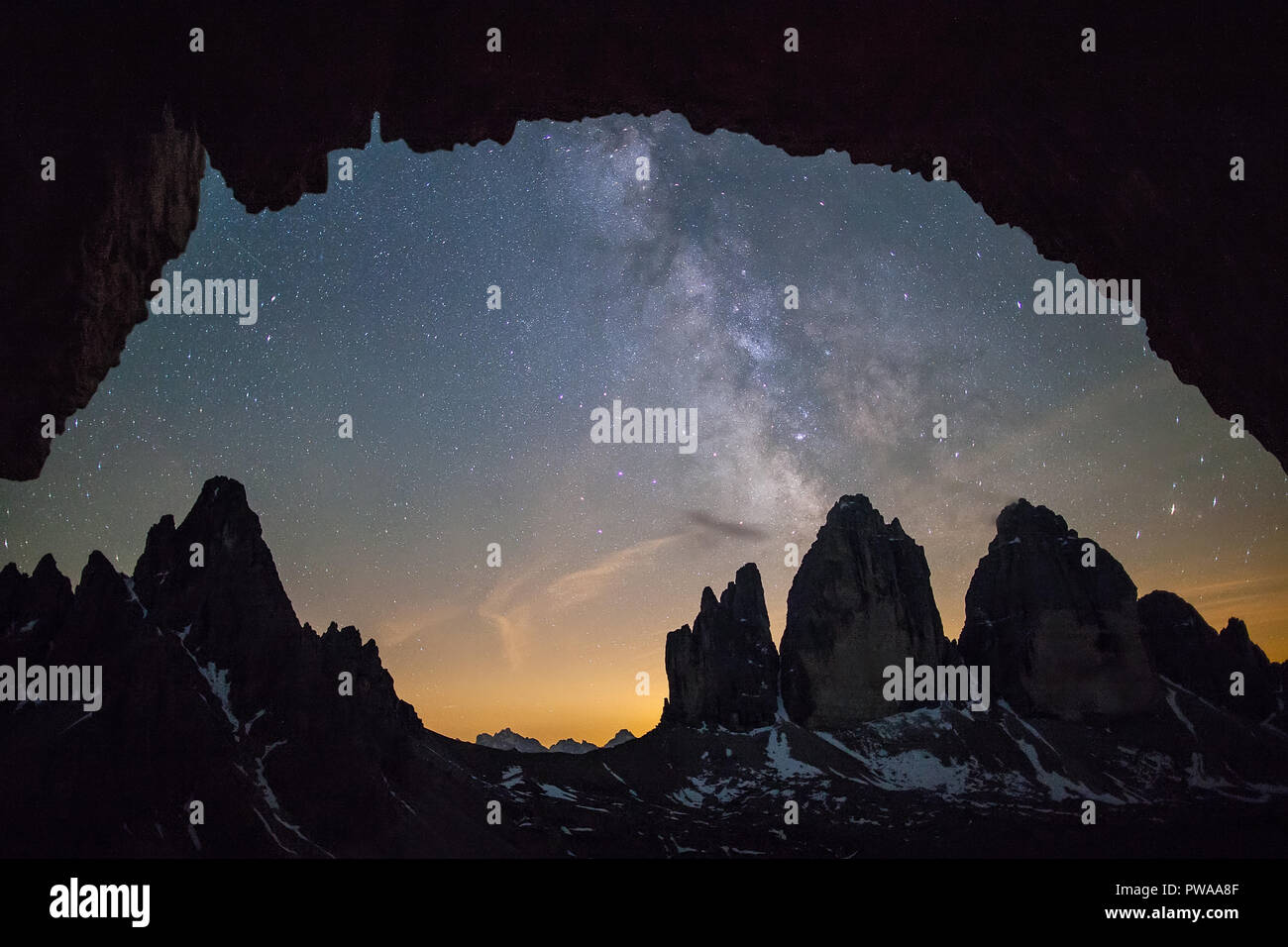 Starry sky and milky way on the majestic peaks of Tre Cime Di Lavaredo ...