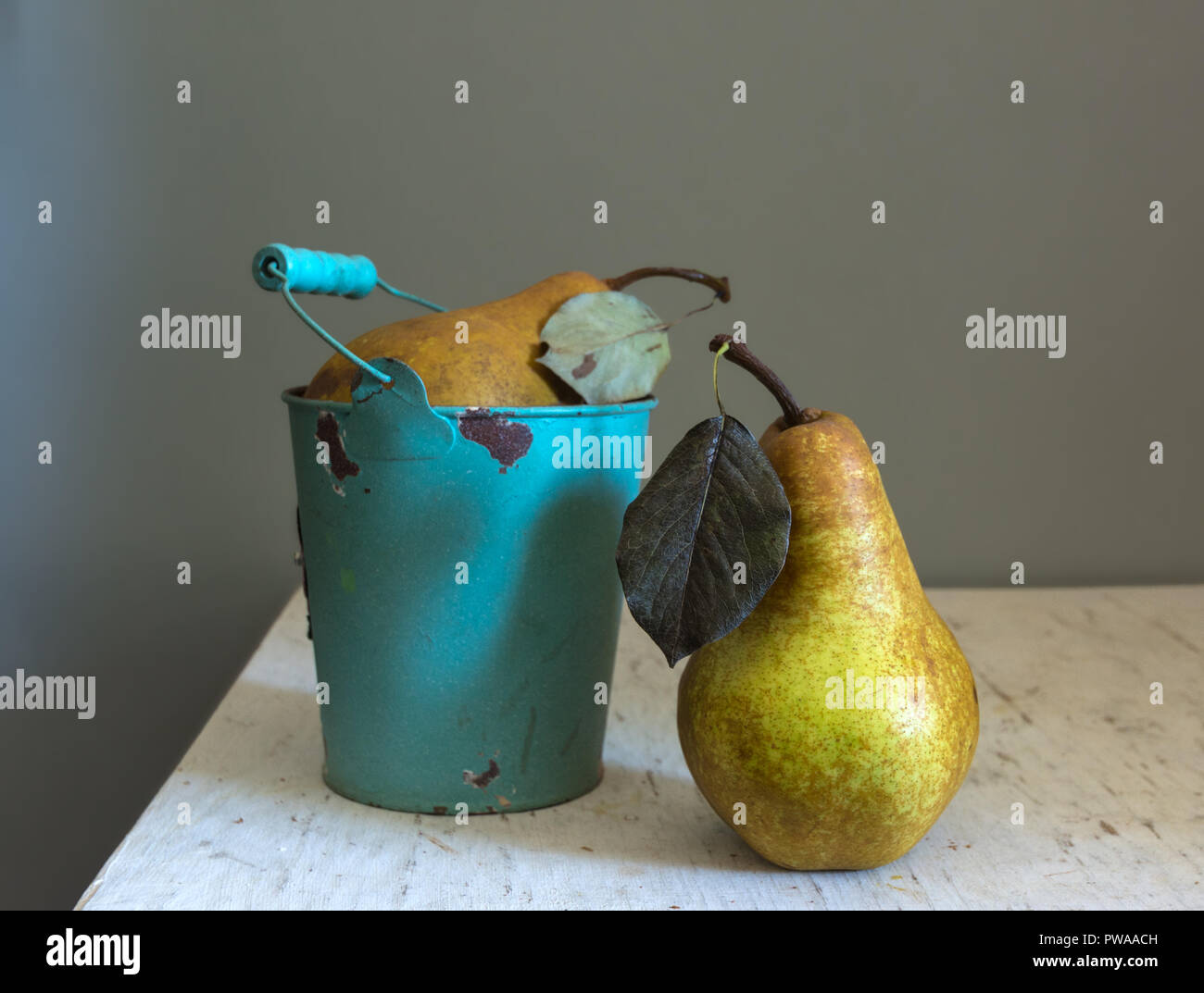 still life with pears and a bucket. fruits. food Stock Photo - Alamy