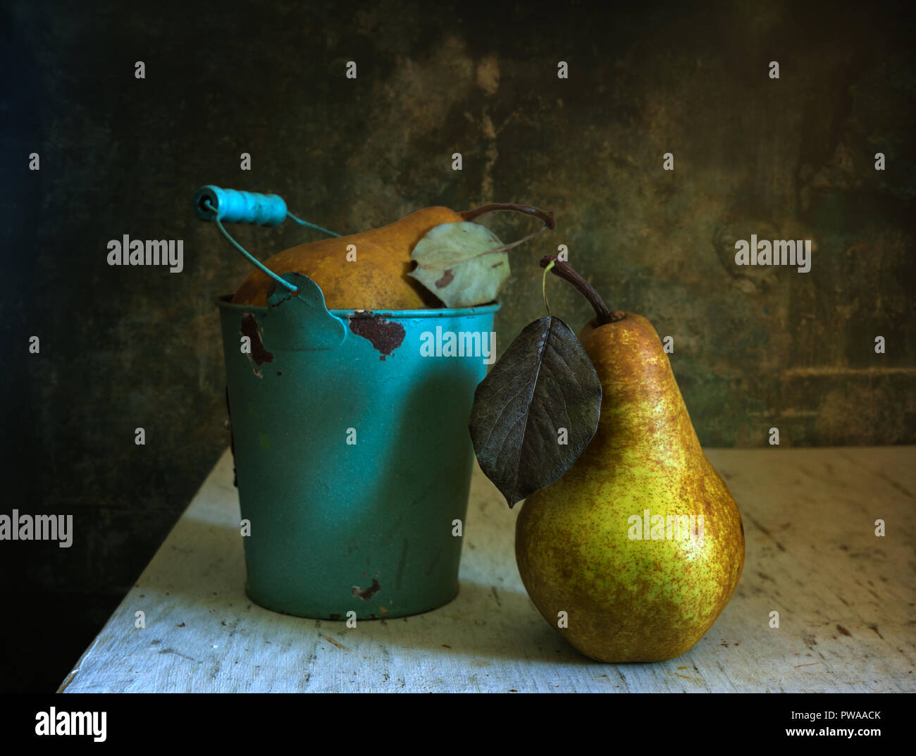 still life with pears and a bucket. fruits. food Stock Photo - Alamy