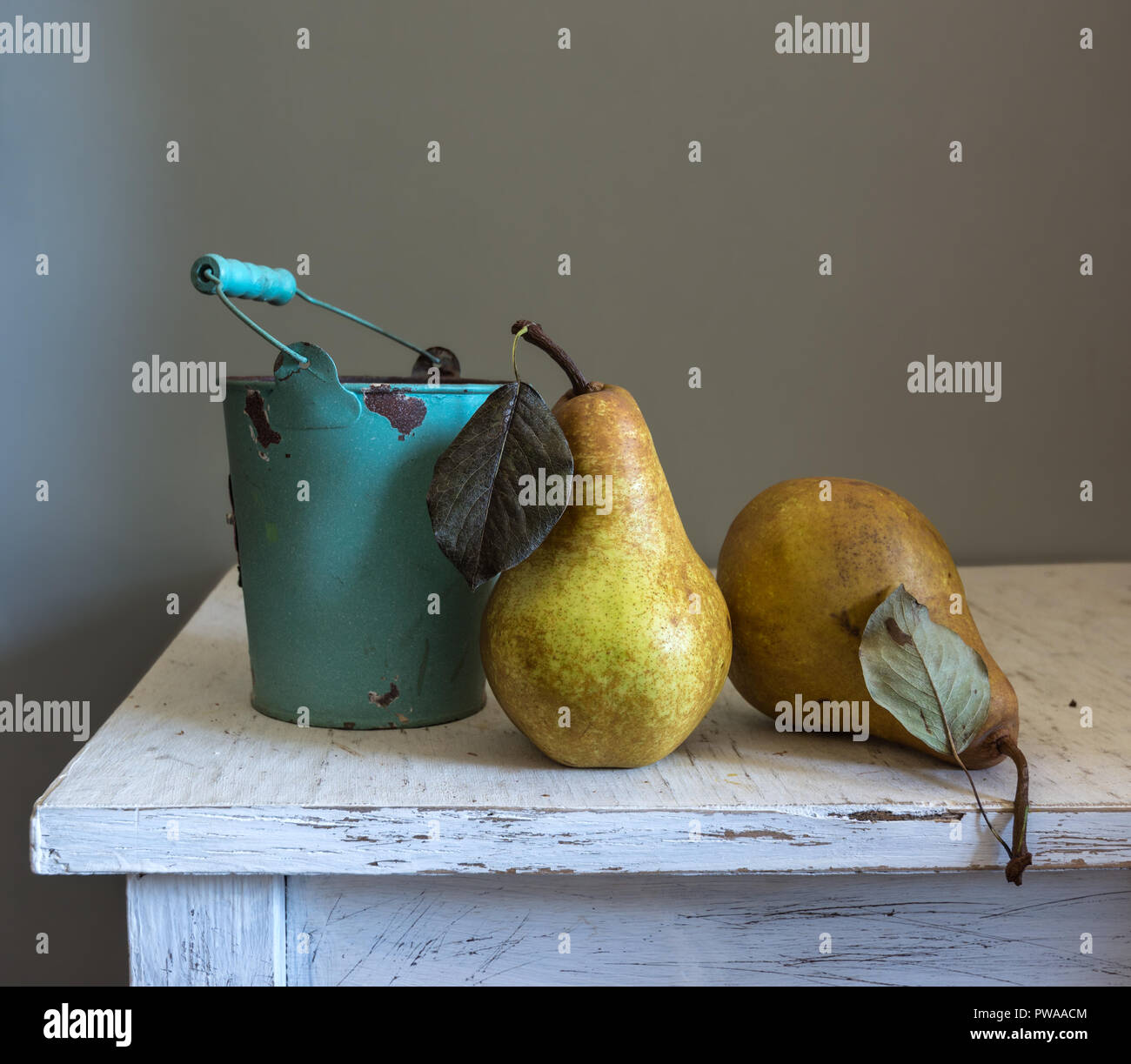 still life with pears and a bucket. fruits. food Stock Photo - Alamy
