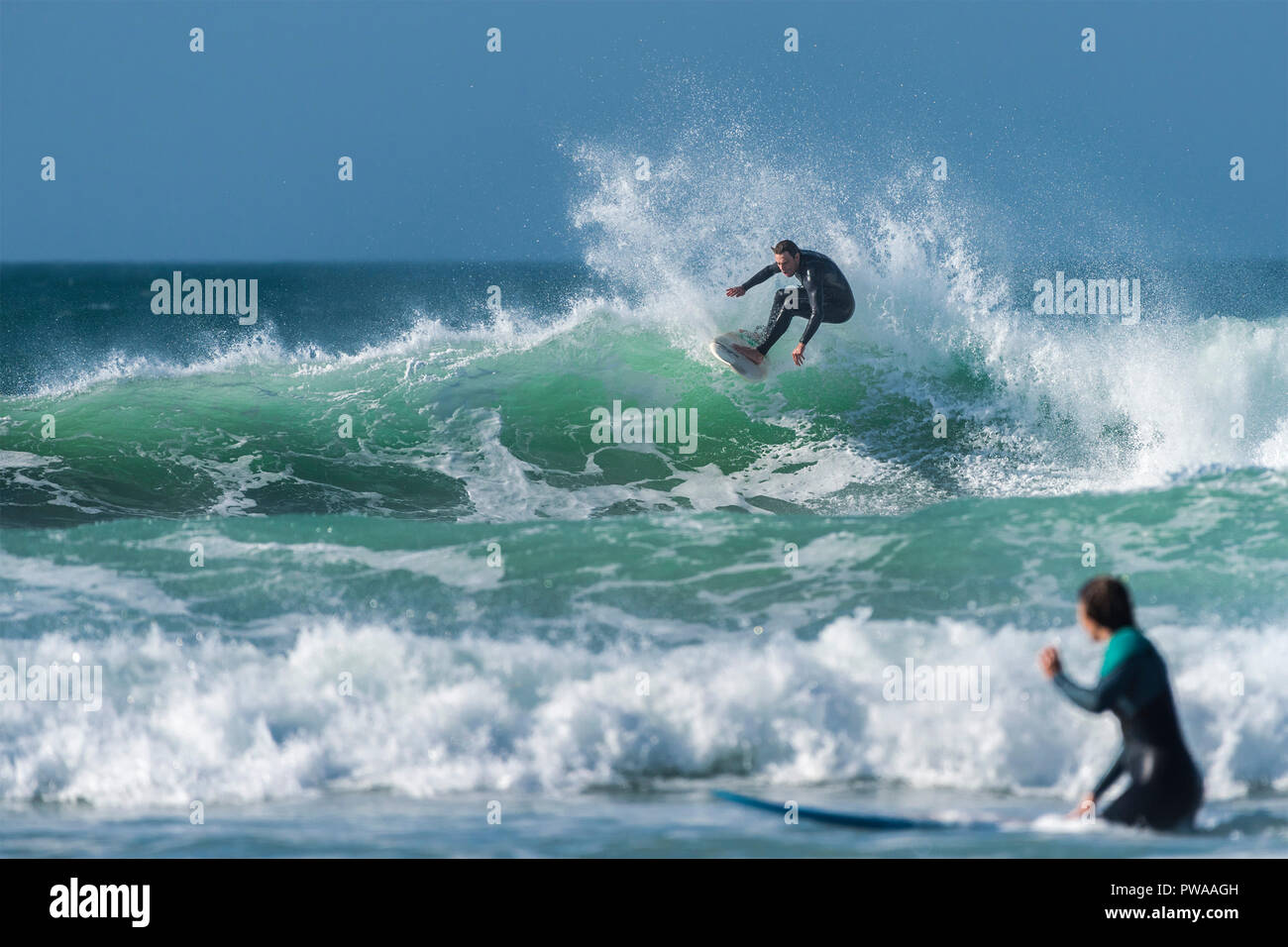 Surfing action at Fistral in Newquay in Cornwall Stock Photo - Alamy