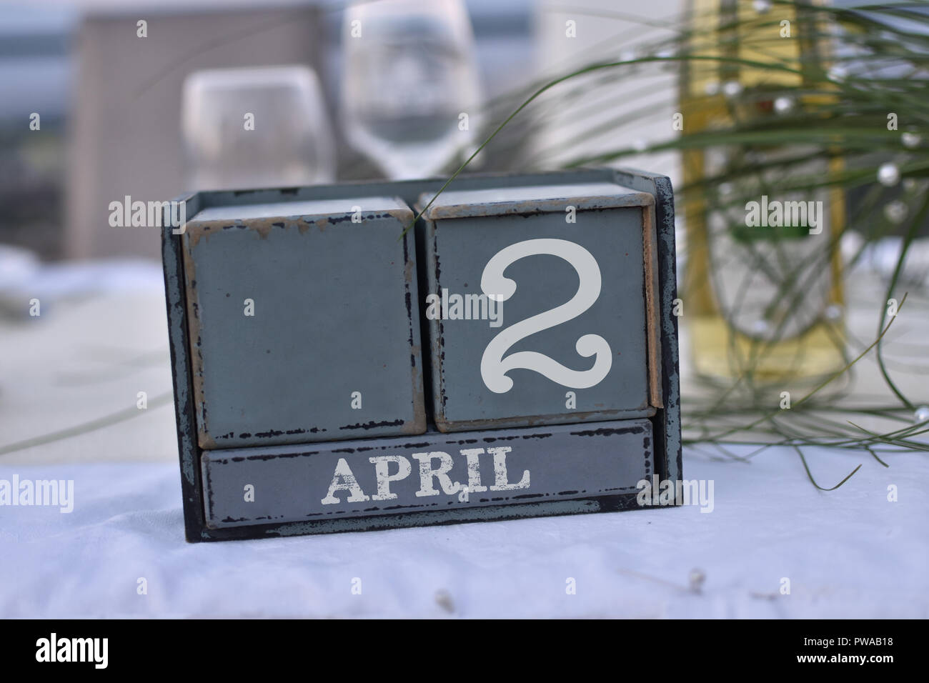Wood blocks in box with date, day and month 2 April. Wooden blocks ...
