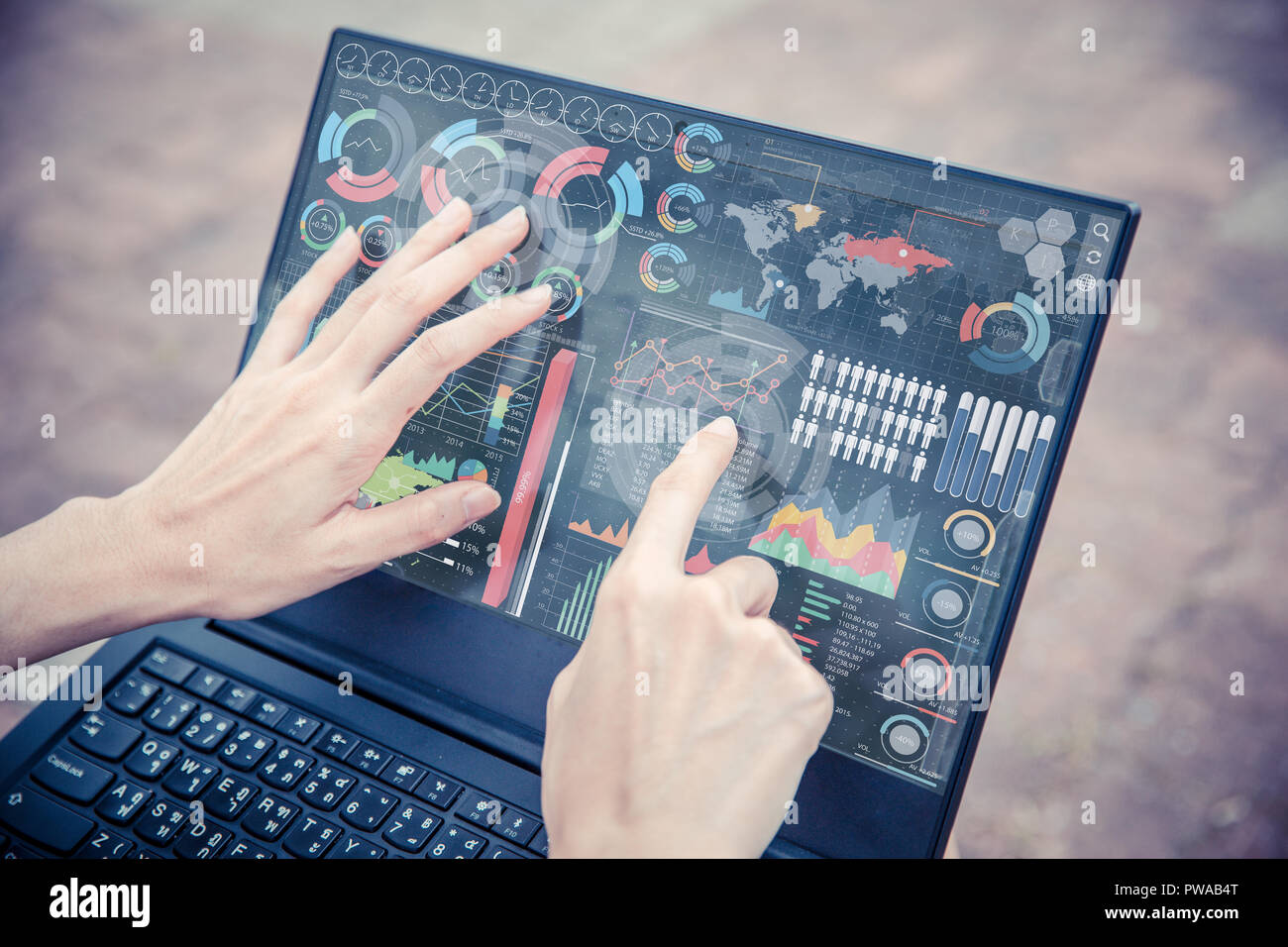 Professional using computer outdoor hi-res stock photography and images ...