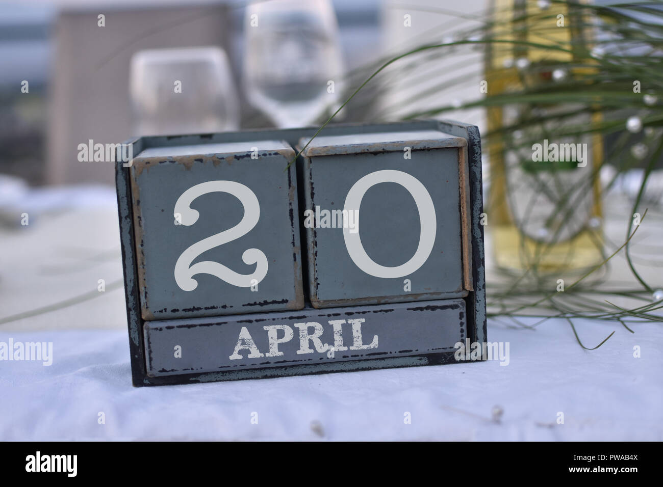 Wood blocks in box with date, day and month 20 April. Wooden blocks ...