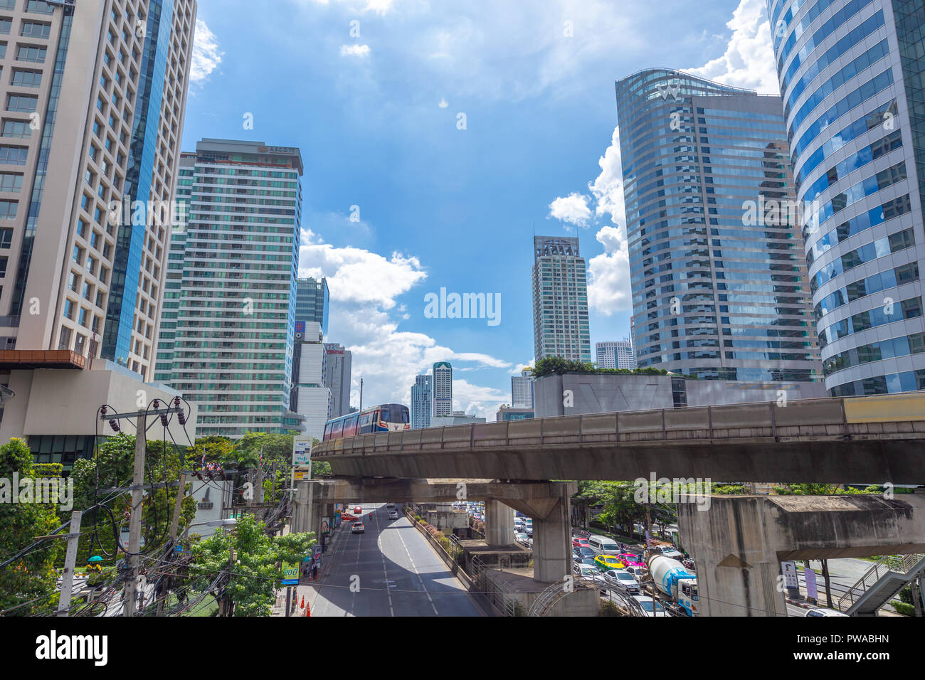Bangkok business office building city view with BTS skyrail in Sathon ...
